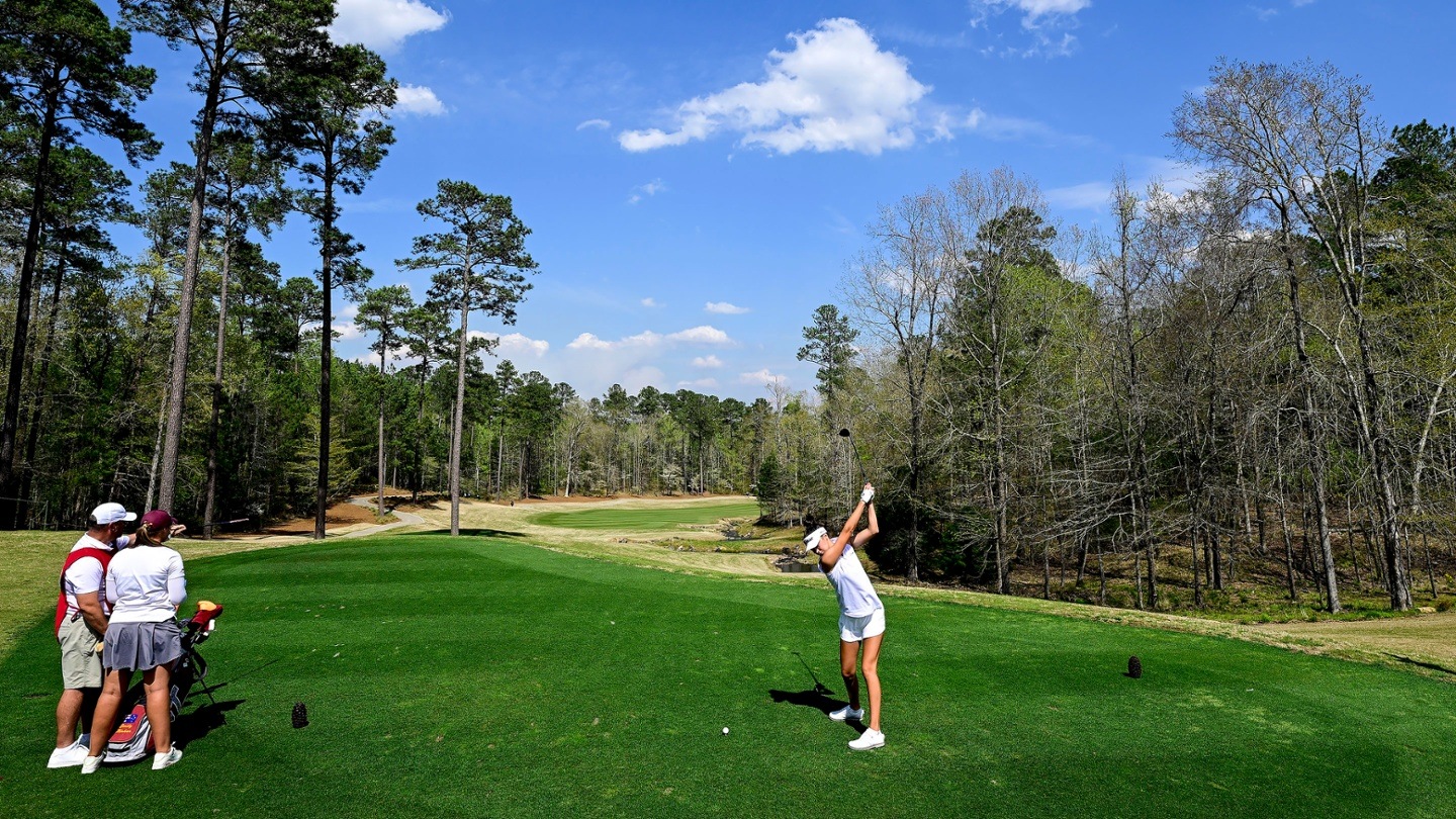 Anna Davis of the United States plays her stroke from the No. 15 tee ...
