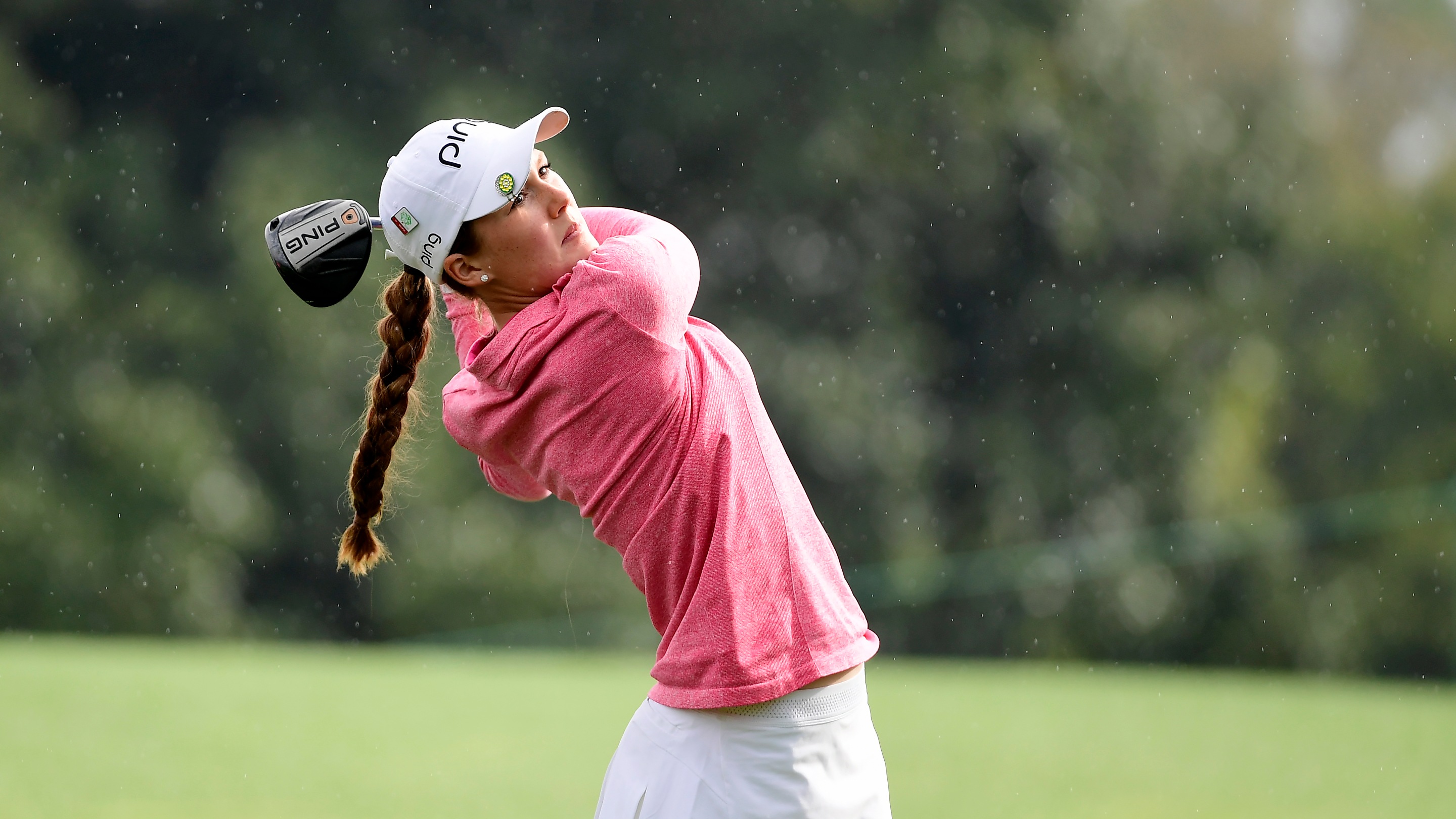 Emilia Migliaccio of the United States plays a shot from the No. 10 tee ...