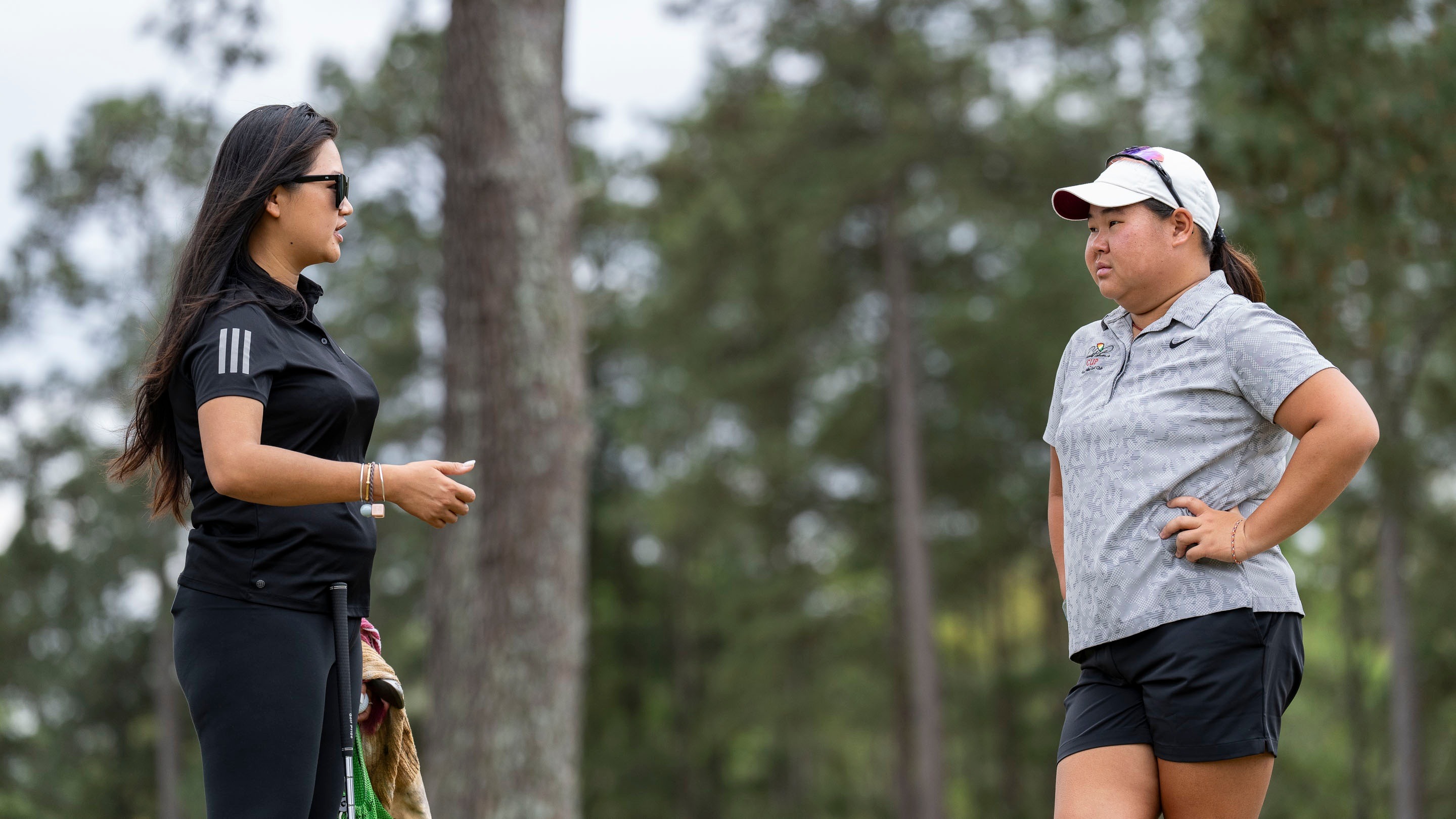 Mirabel Ting of Malaysia on the practice range with Malaysian ...